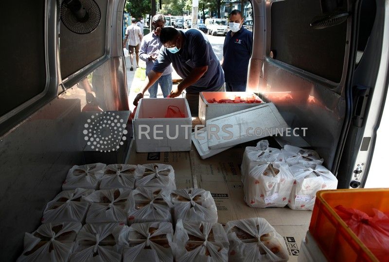 Pastor helps keep Singapore's migrant workers fed during COVID-19 ...