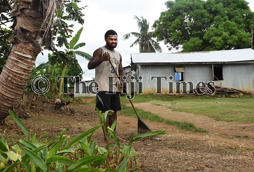Villagers engage in clean up - The Fiji Times