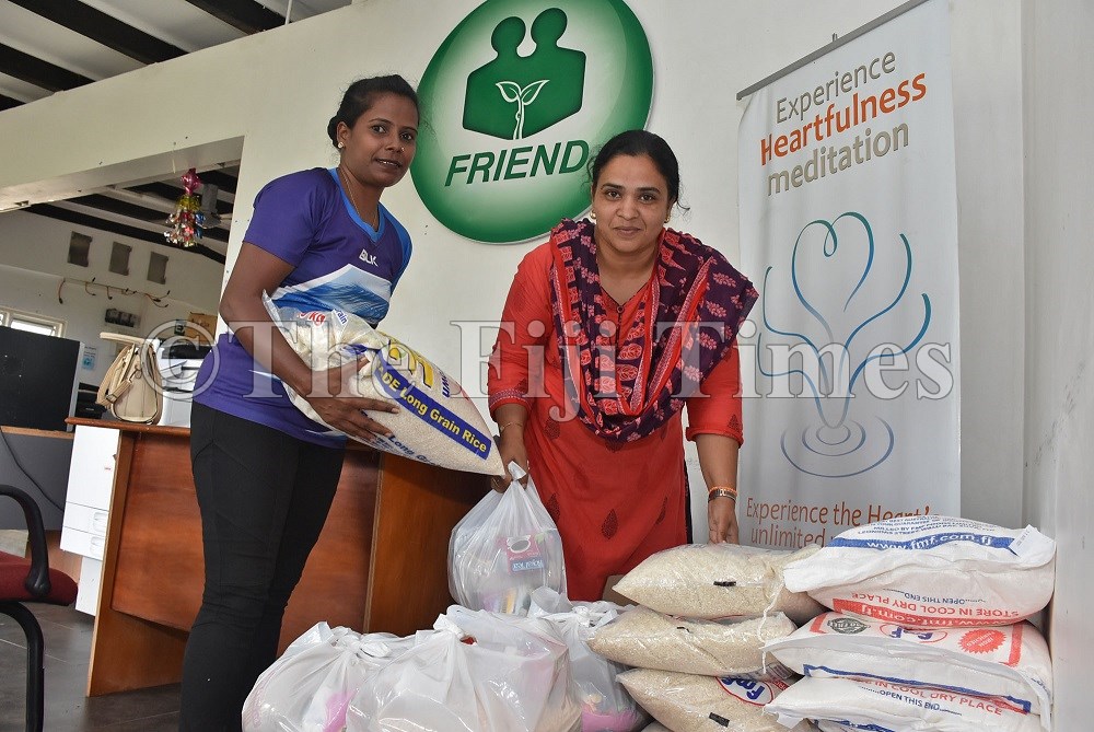 NGO gives food packs - The Fiji Times