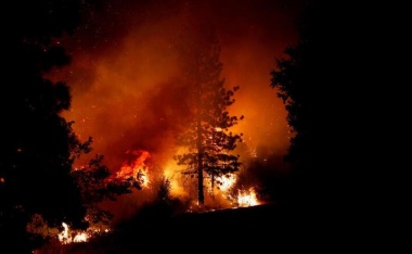 Raging wildfires destroy Washington town, roar through California ...