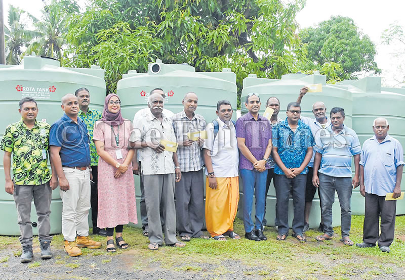 Farmers receive water tanks in bid to boost production - The Fiji Times