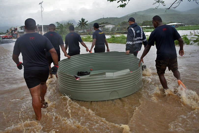 Cut-out water tank transports pregnant woman; boat and engine needed ...