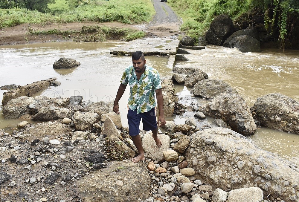 Rural communities build hanging bridges - The Fiji Times