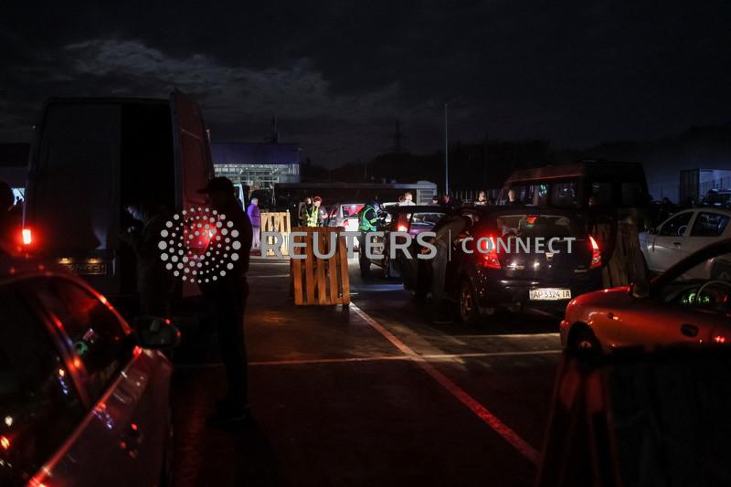 Large convoy from Mariupol reaches safety, refugees talk of ...