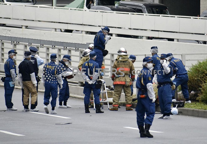 Man who set himself on fire near Japan's PM office is unconscious - TV ...