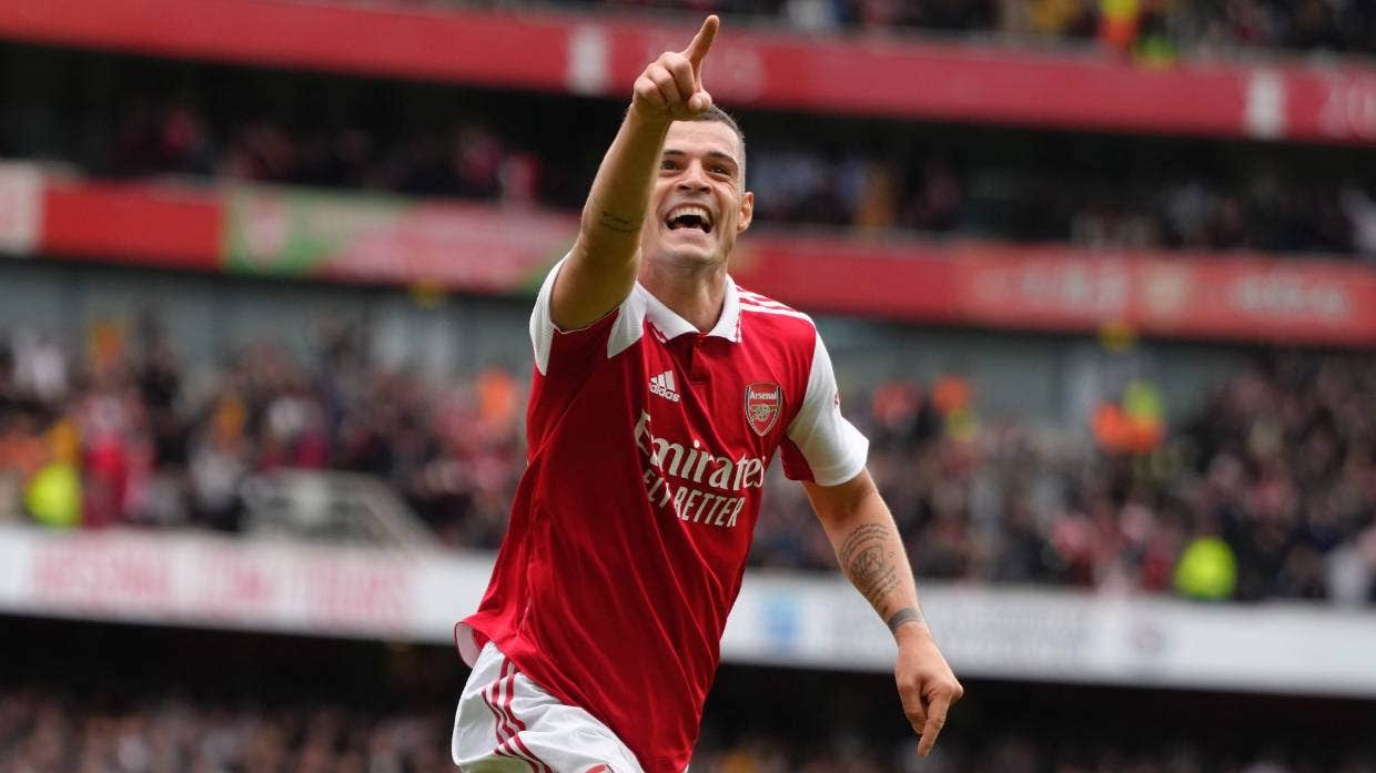 Arsenal beat Tottenham to stay atop English Premier League table - The ...