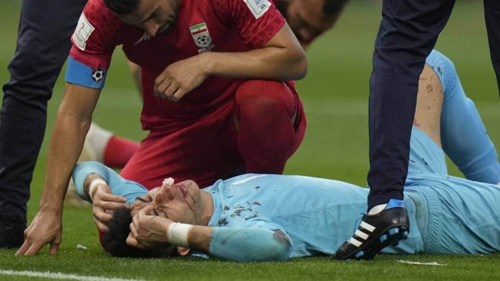 Fifa accused of 'failing players' over Iran goalkeeper's concussion in ...