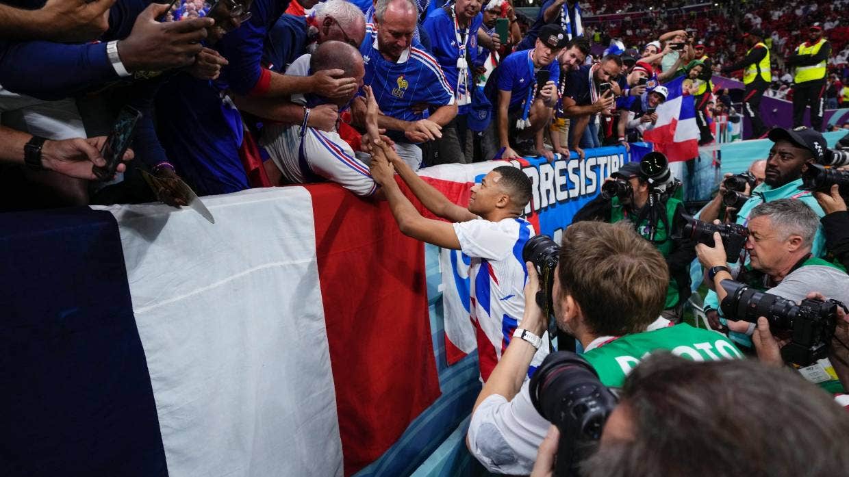 France star Kylian Mbappe attends to fan ahead of World Cup semifinal match - The Fiji Times