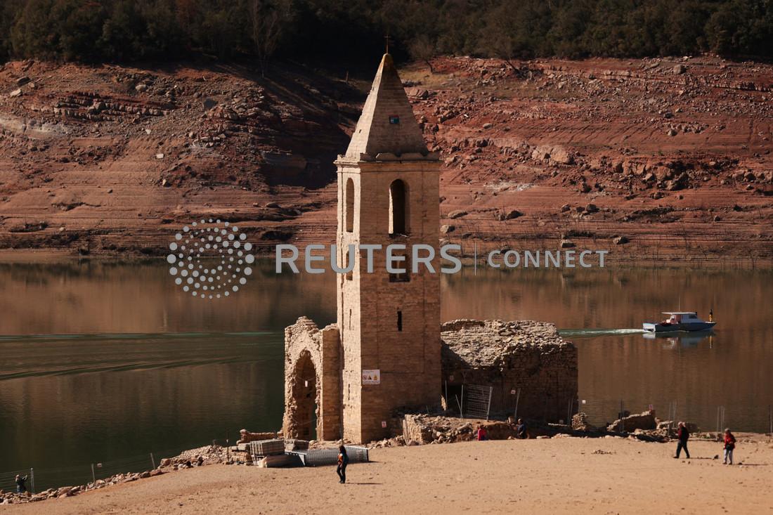 Church tower reemerges from parched reservoir in drought-hit Spain ...