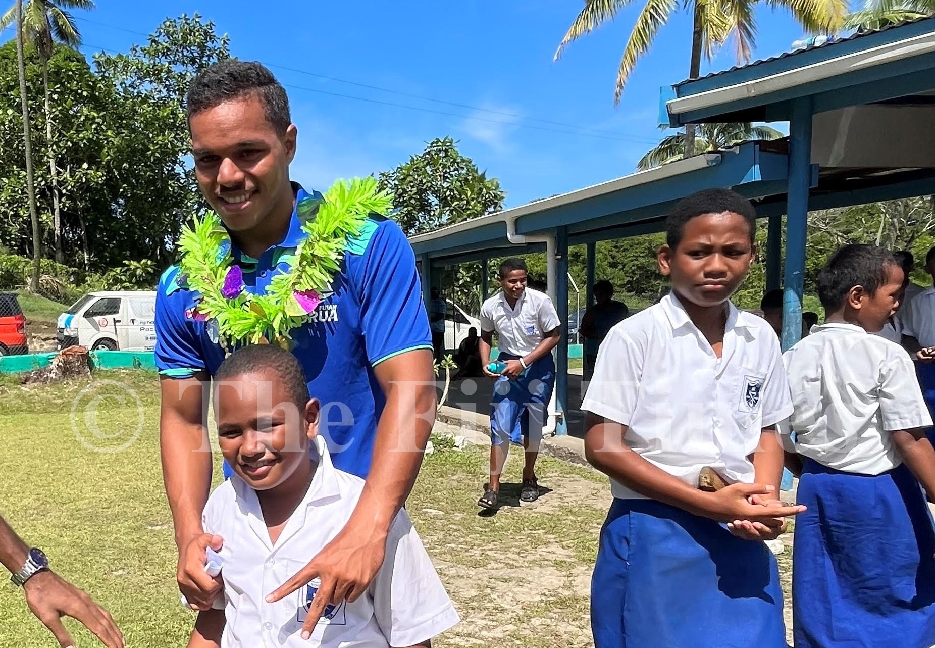 Super rugby players visit Draiba Primary School - The Fiji Times
