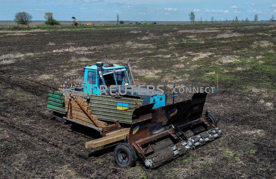 Ukrainian farmer comes up with novel way to demine his fields - The ...
