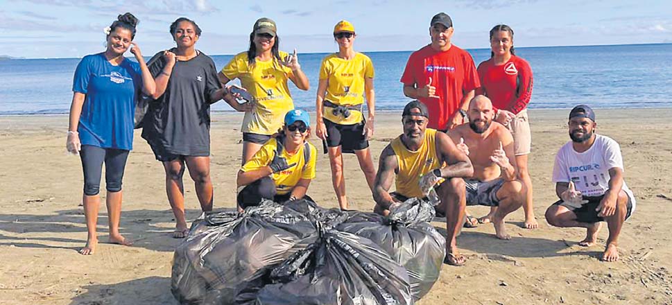 Club's paddlers clean up beach - The Fiji Times
