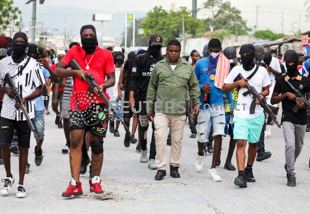 Haitian gangs call for armed overthrow of PM Henry as chaos escalates ...