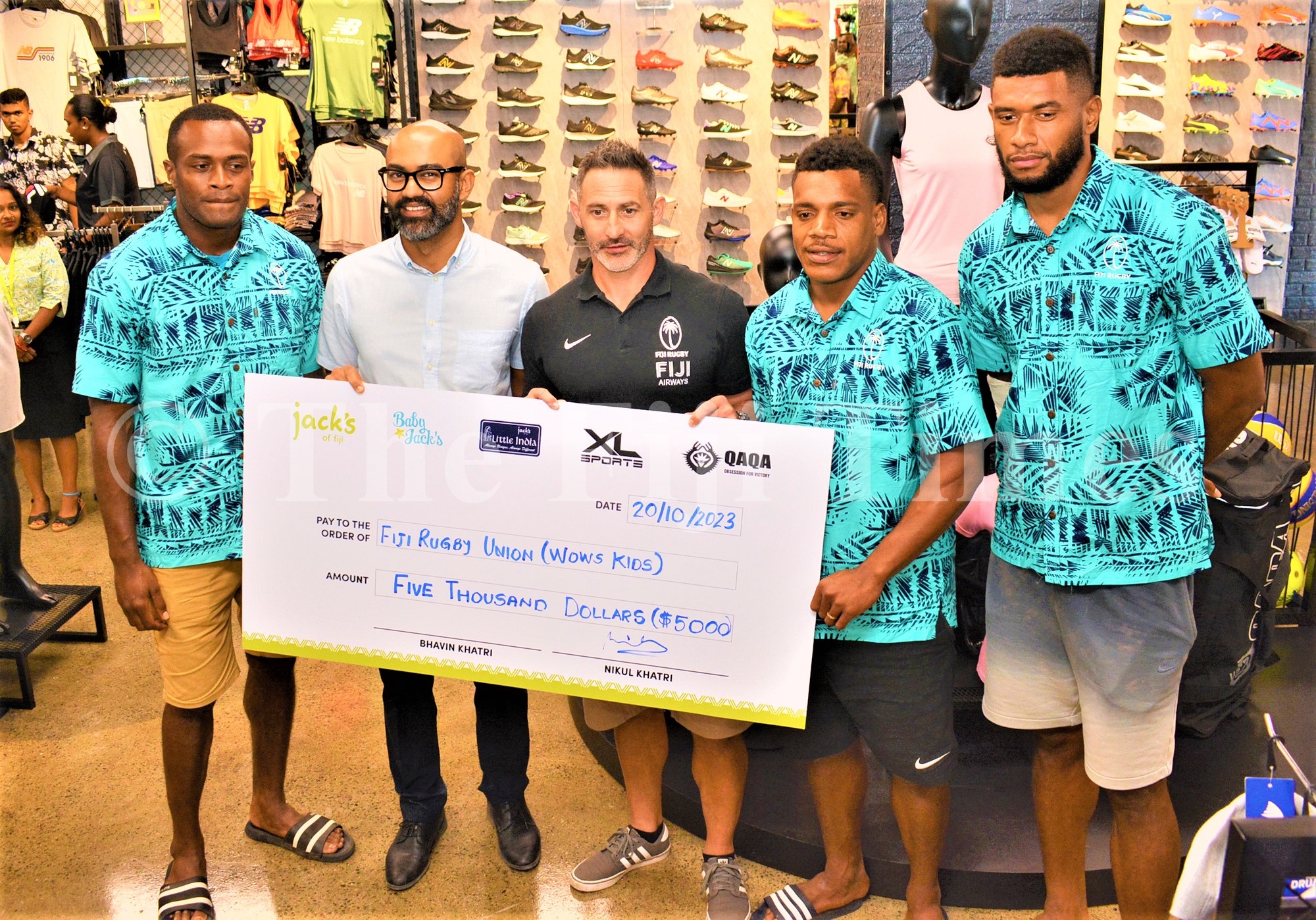 Cheque for the fight against childhood cancer - The Fiji Times