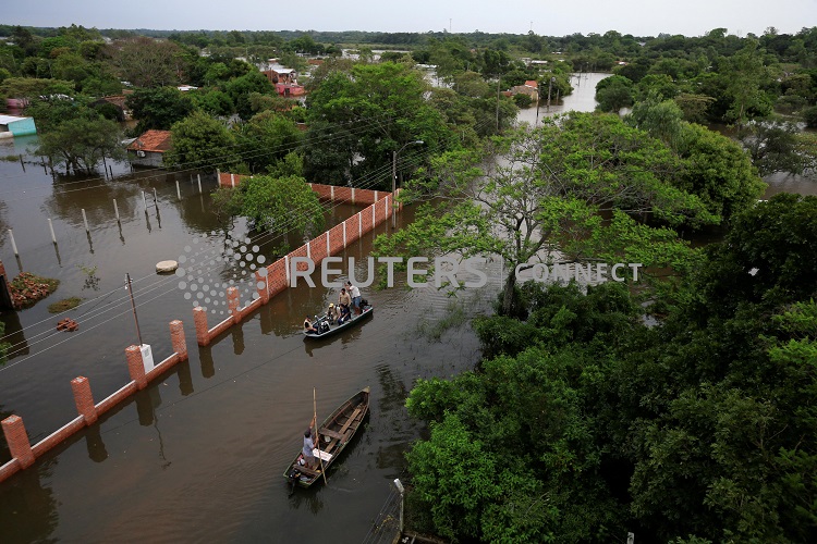 El Nino rains wipe out Paraguay neighborhoods, with more to come - The ...