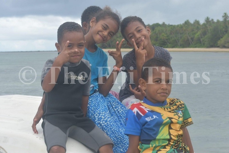 Children practice traditional fishing in Gau - The Fiji Times