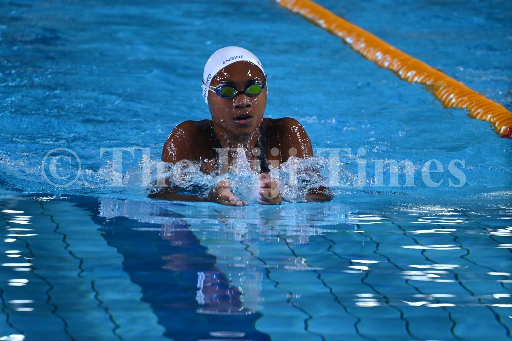 Swimmers return home - The Fiji Times