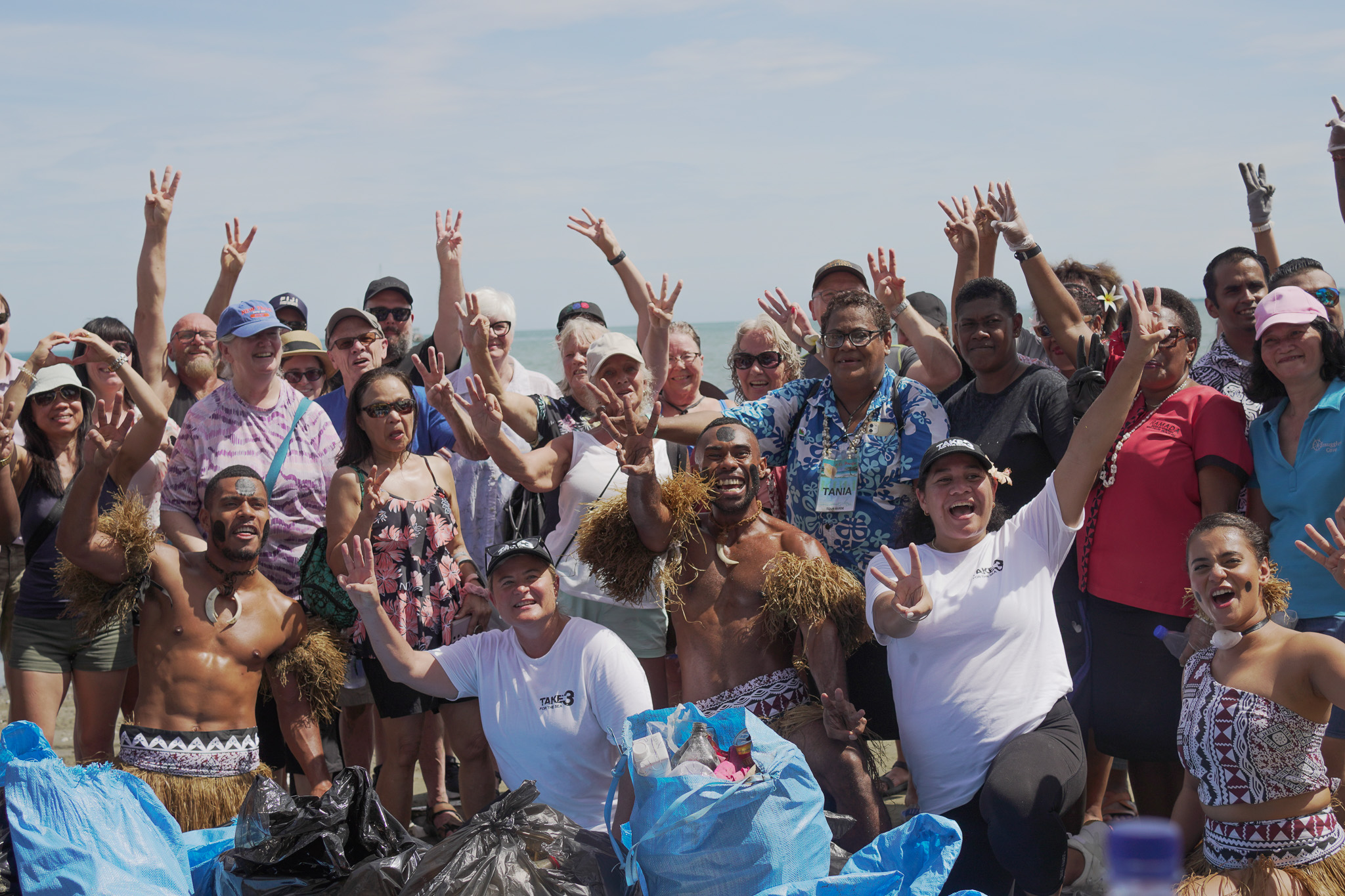 Tourists clean up beach - The Fiji Times