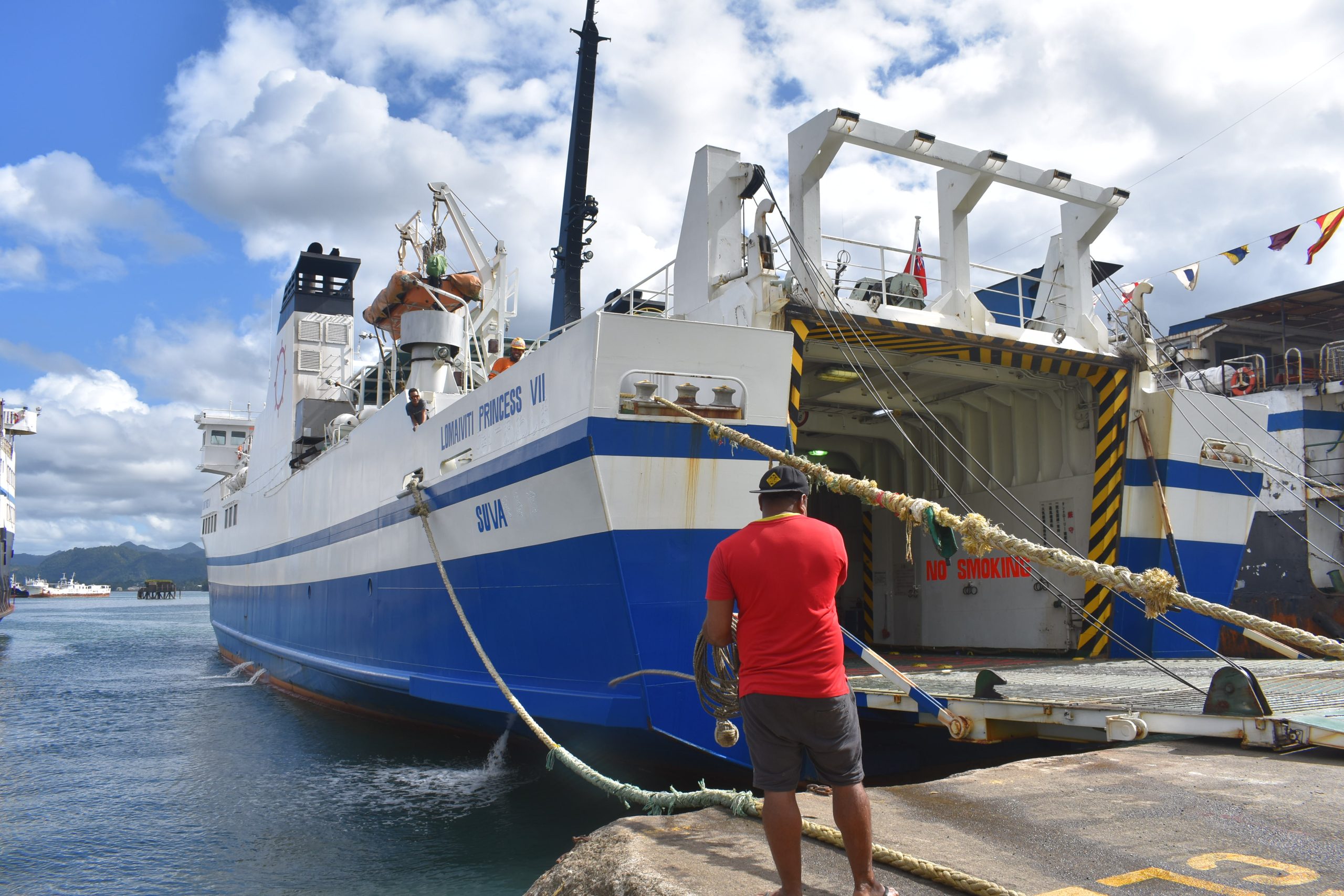 Boat passengers drift in rough seas