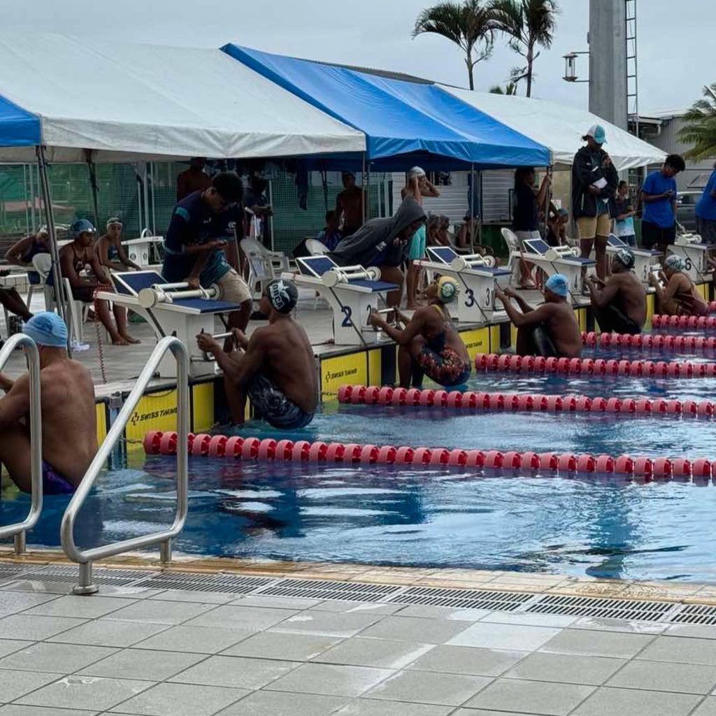 Tritons win swim title - The Fiji Times