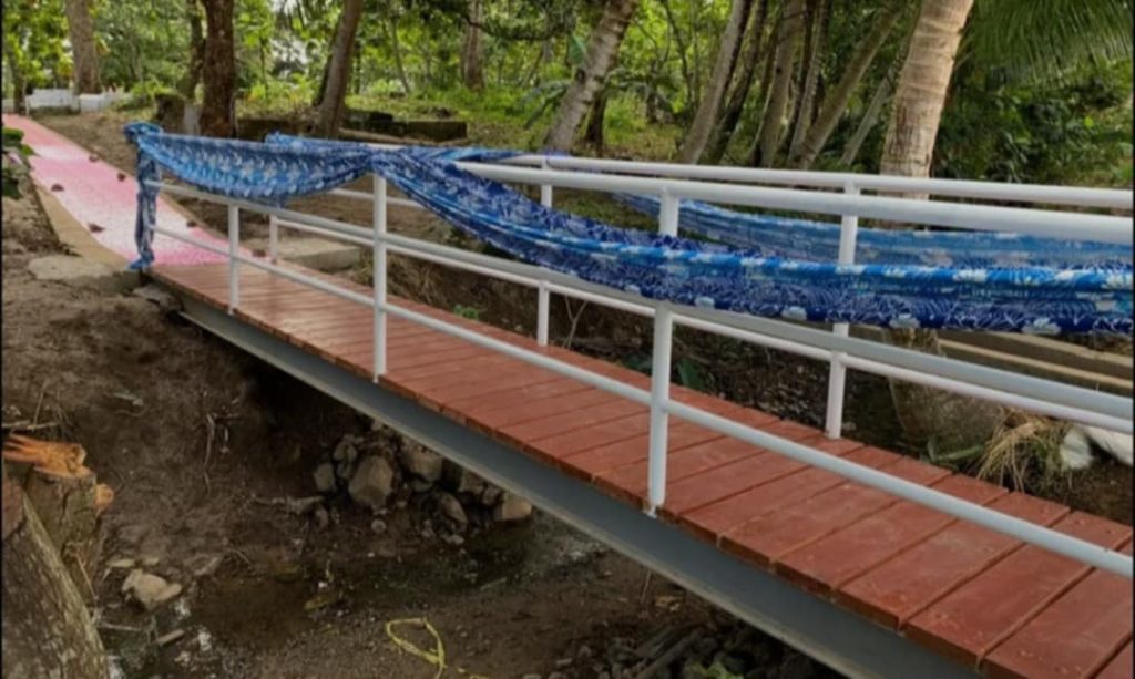 New foot crossing bridge brings relief to community