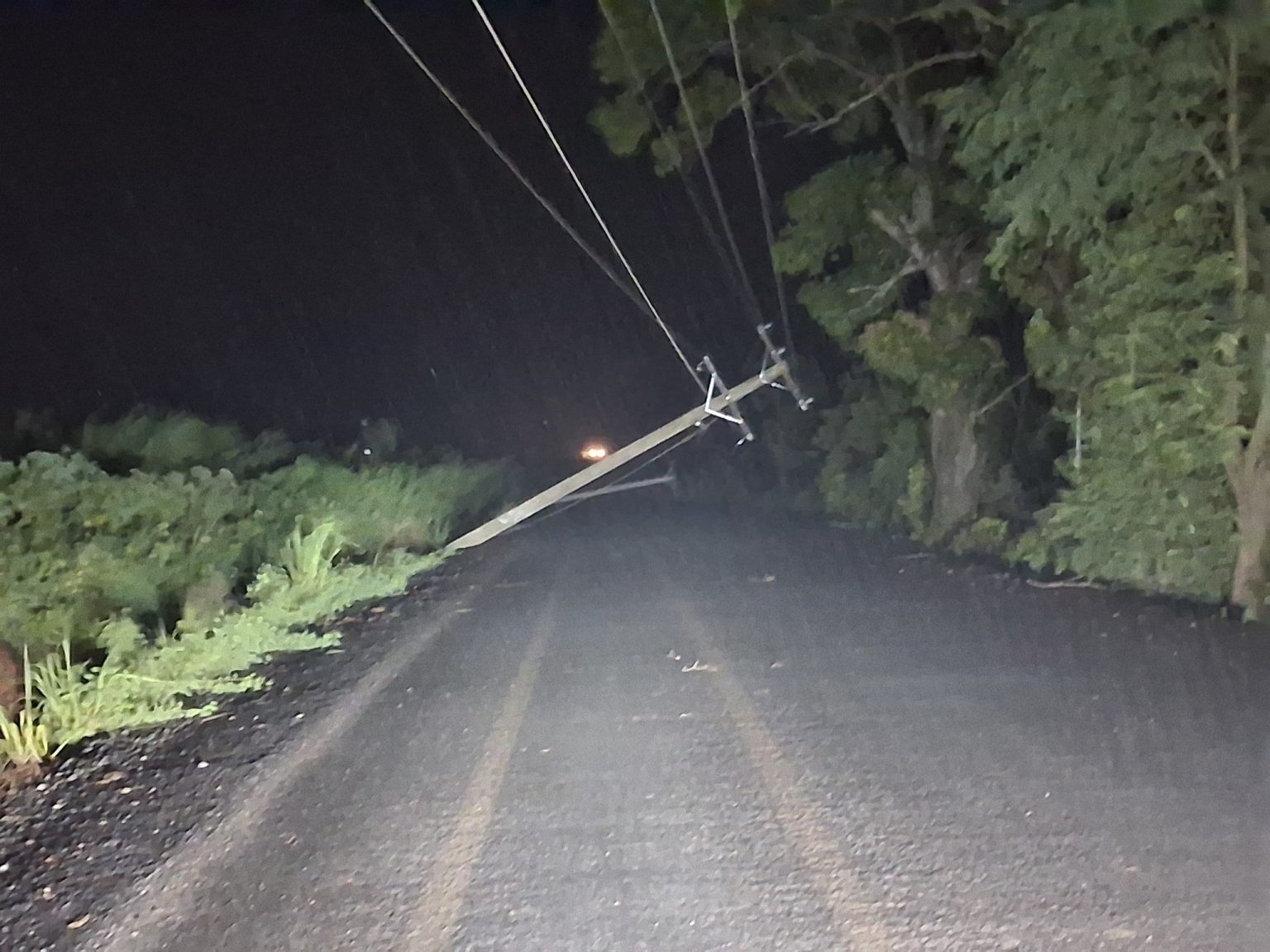 70km/h winds knock down power post as rain warning downgraded - The ...